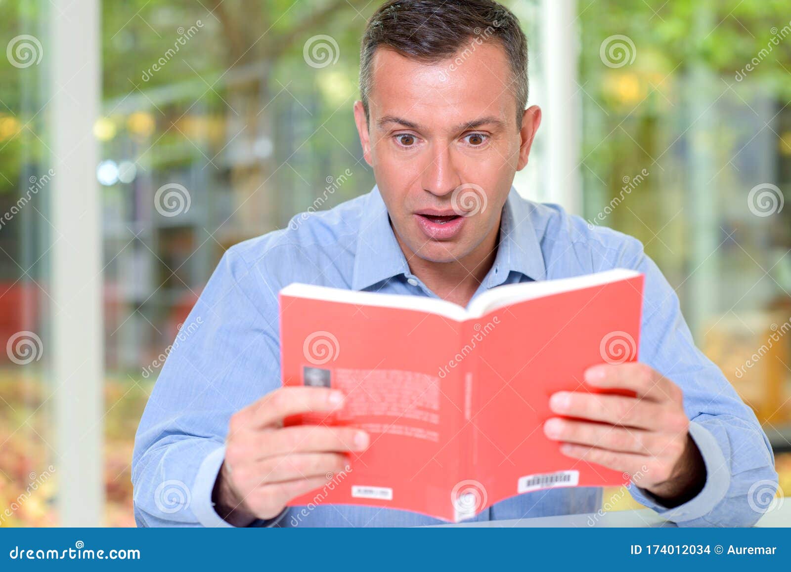 Shocked Reader Reading Book Stock Photo - Image of hobby, surprise ...