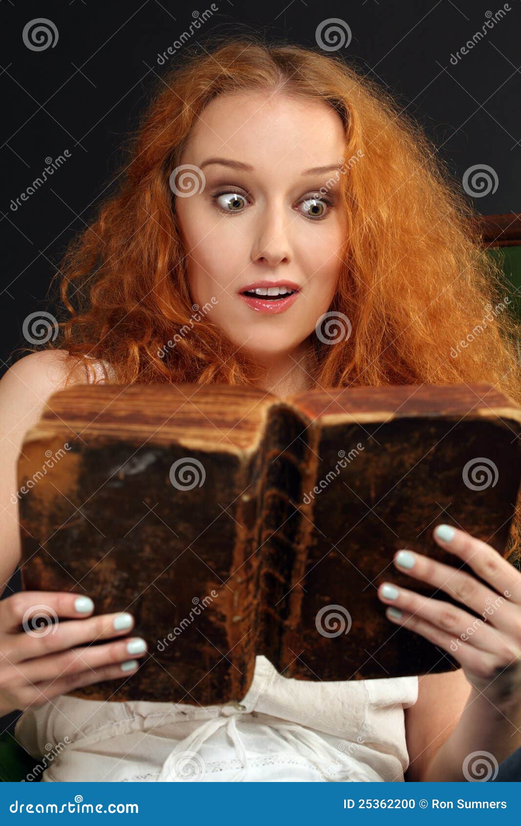 Shocked while Reading a Book Stock Photo - Image of student, book: 25362200