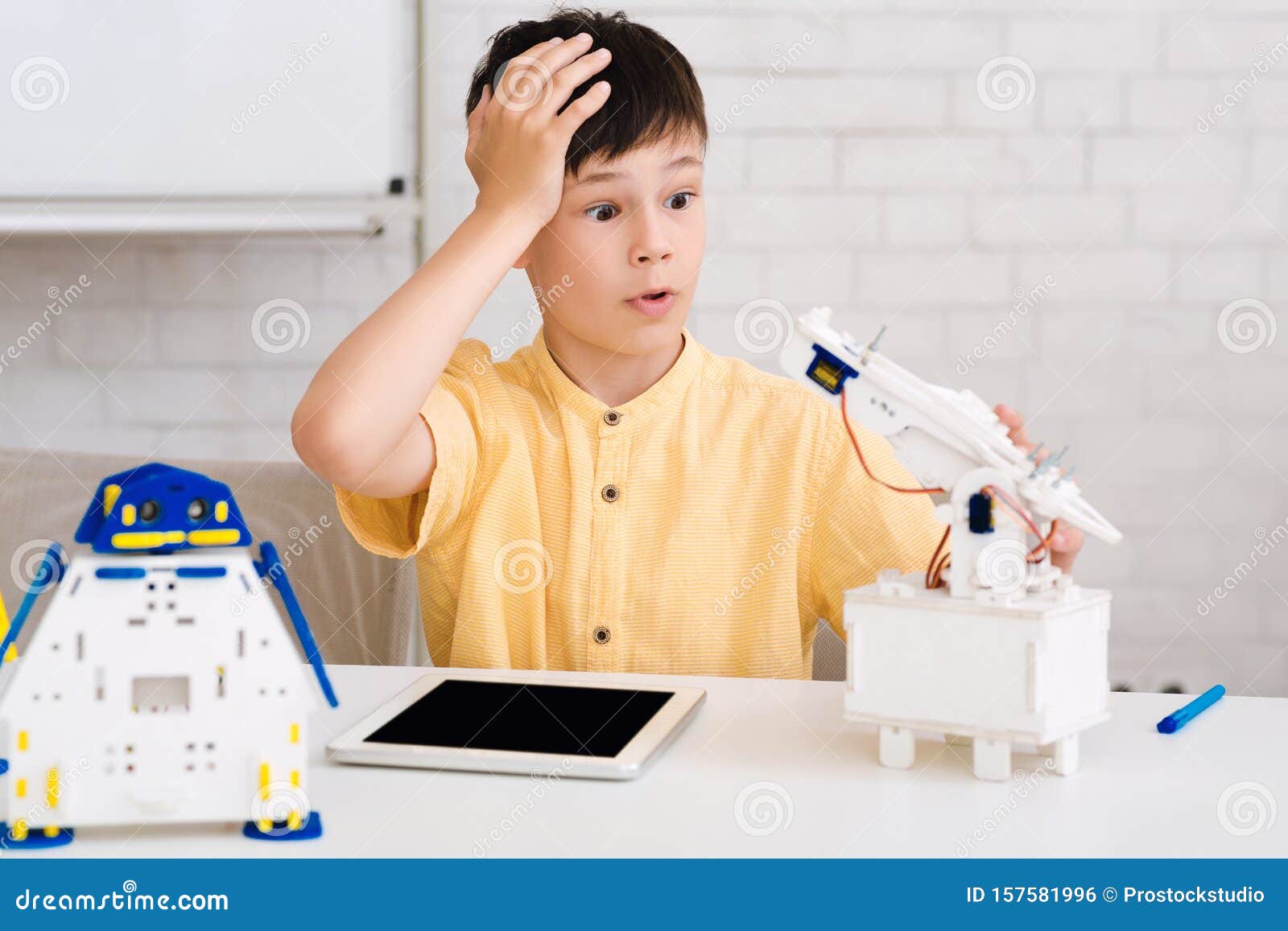 Shocked Schoolboy Made Mistake when Creating Robot at Stem Class Stock ...