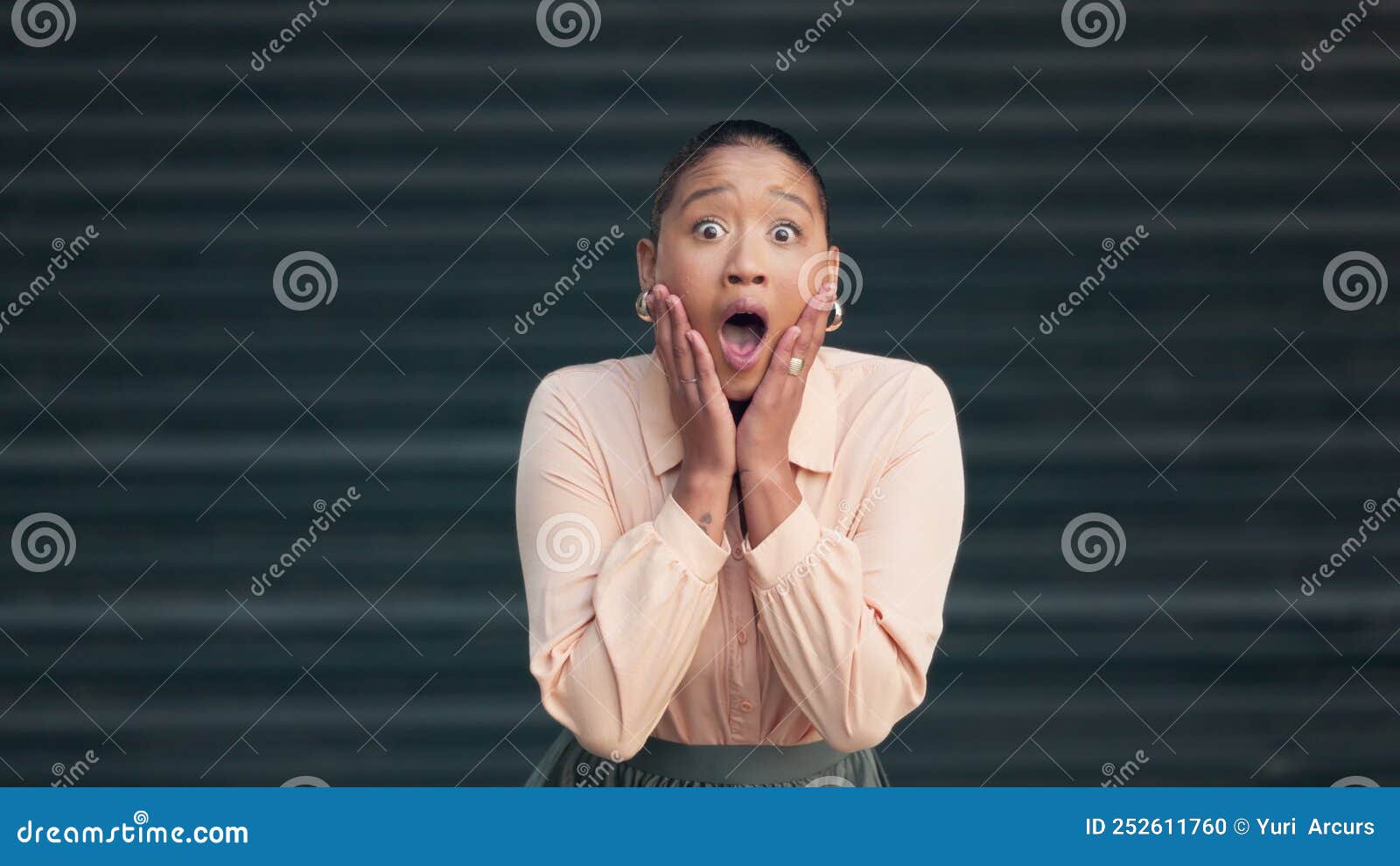 Shocked Surprised And Amazed Woman With Hands On Face Looking Alarmed