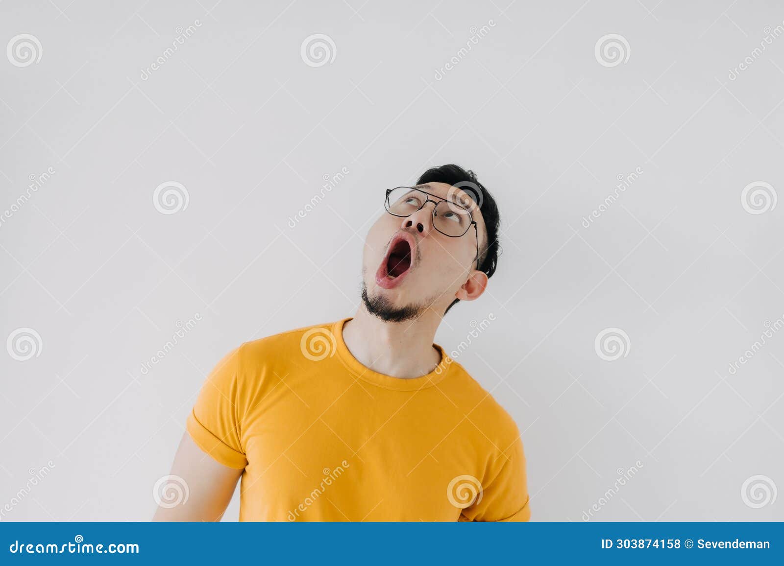 Shocked Surprised Face Asian Man Yellow T Shirt Eyeglasses Isolated On