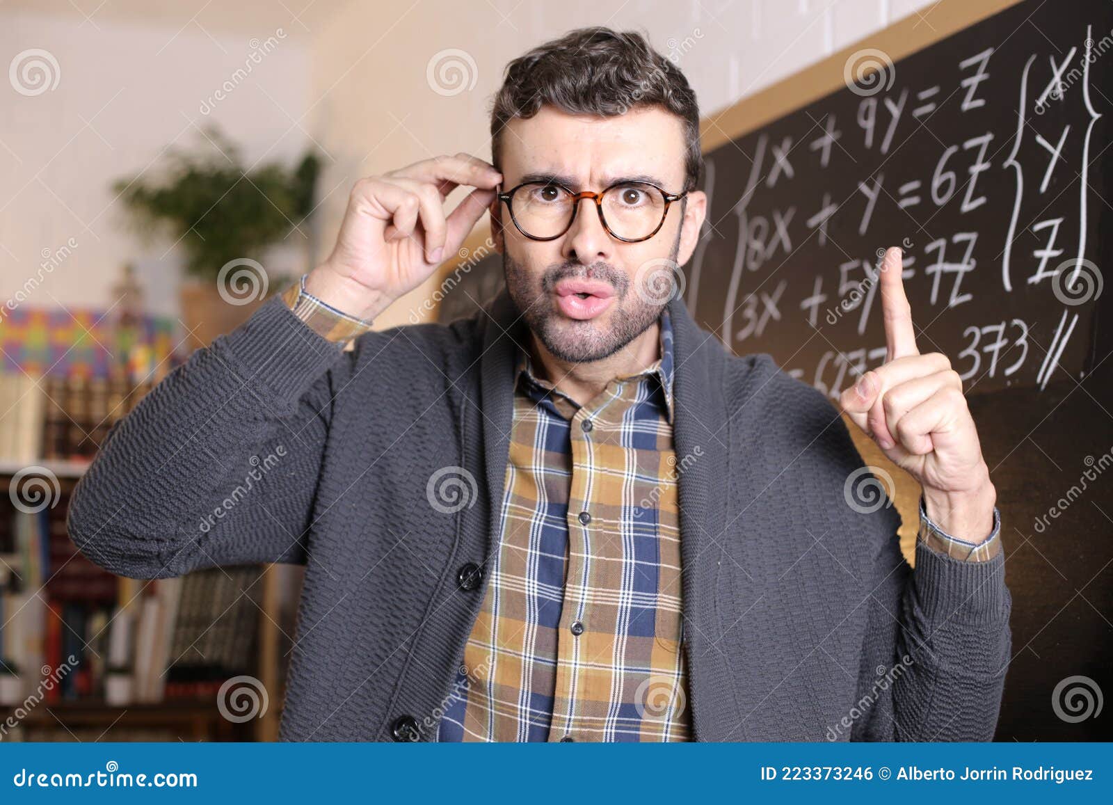 Shocked Teacher Expressing Frustration in Classroom Stock Photo - Image ...