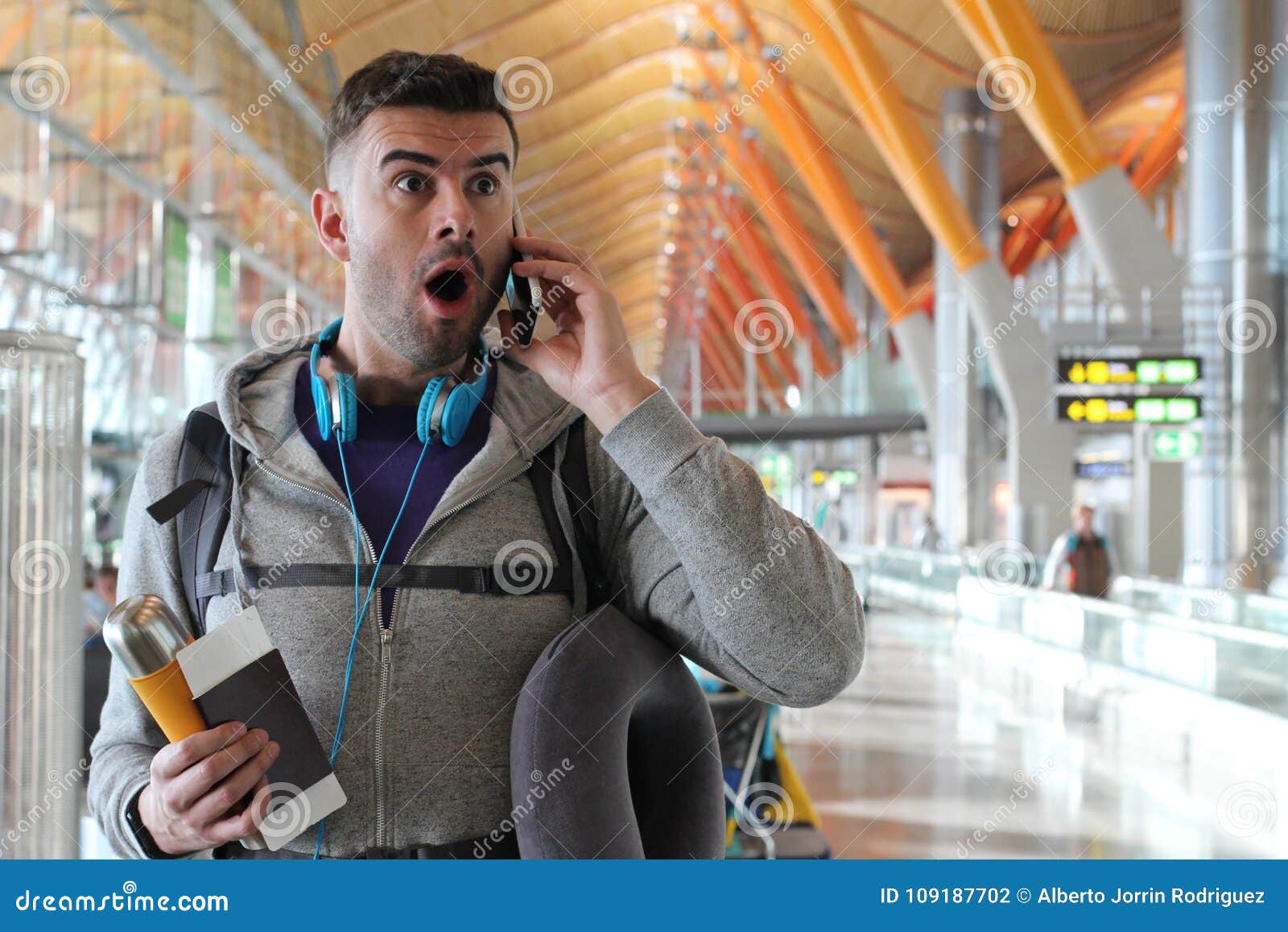 Shocked Traveler Getting an Unexpected Phone Call Stock Photo - Image ...