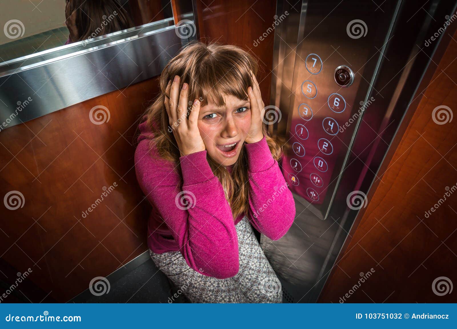 Shocked Woman with Claustrophobia in the Moving Elevator Stock Photo ...