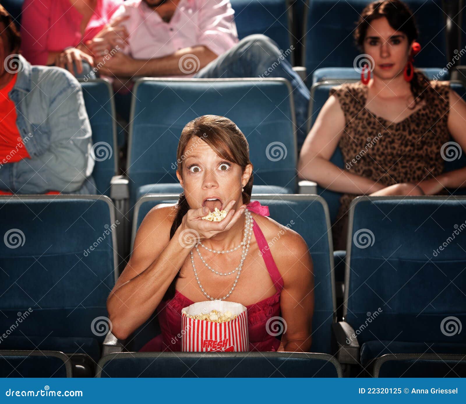 Shocked Woman Eats Popcorn stock image. Image of open - 22320125