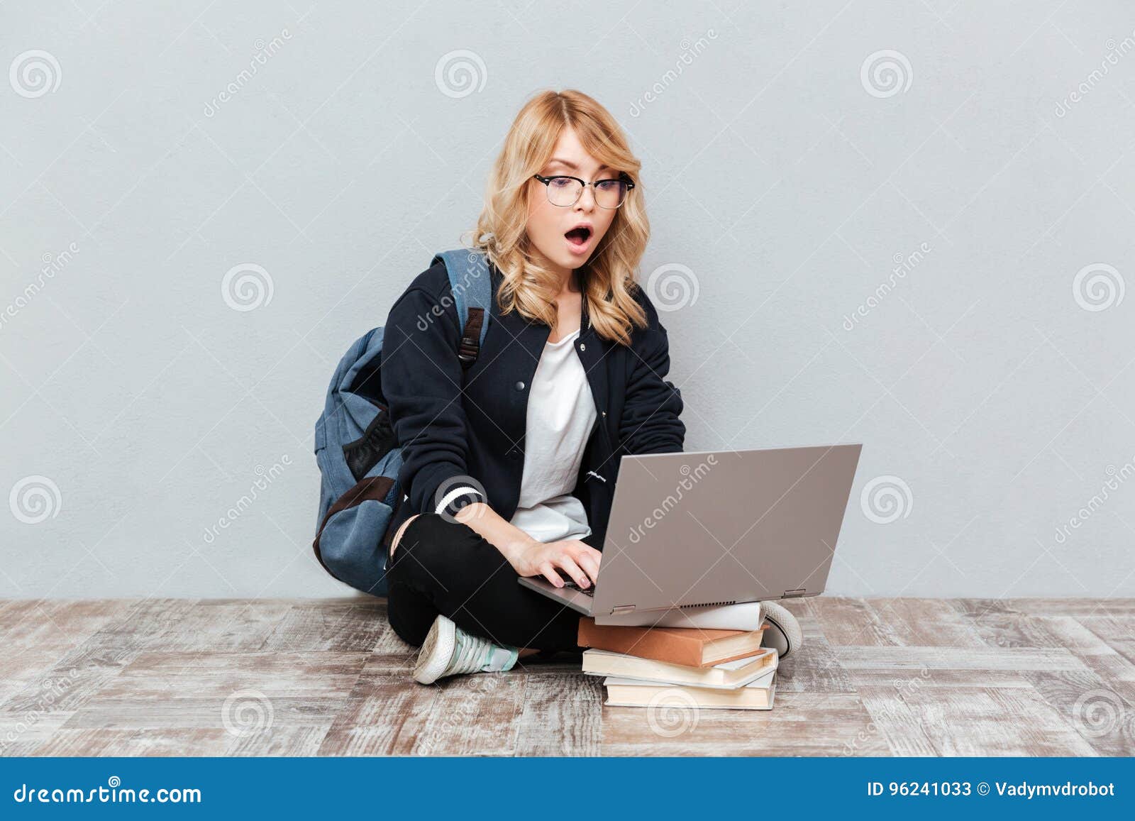 Shocked Young Woman Student Using Laptop Computer. Stock Image - Image ...