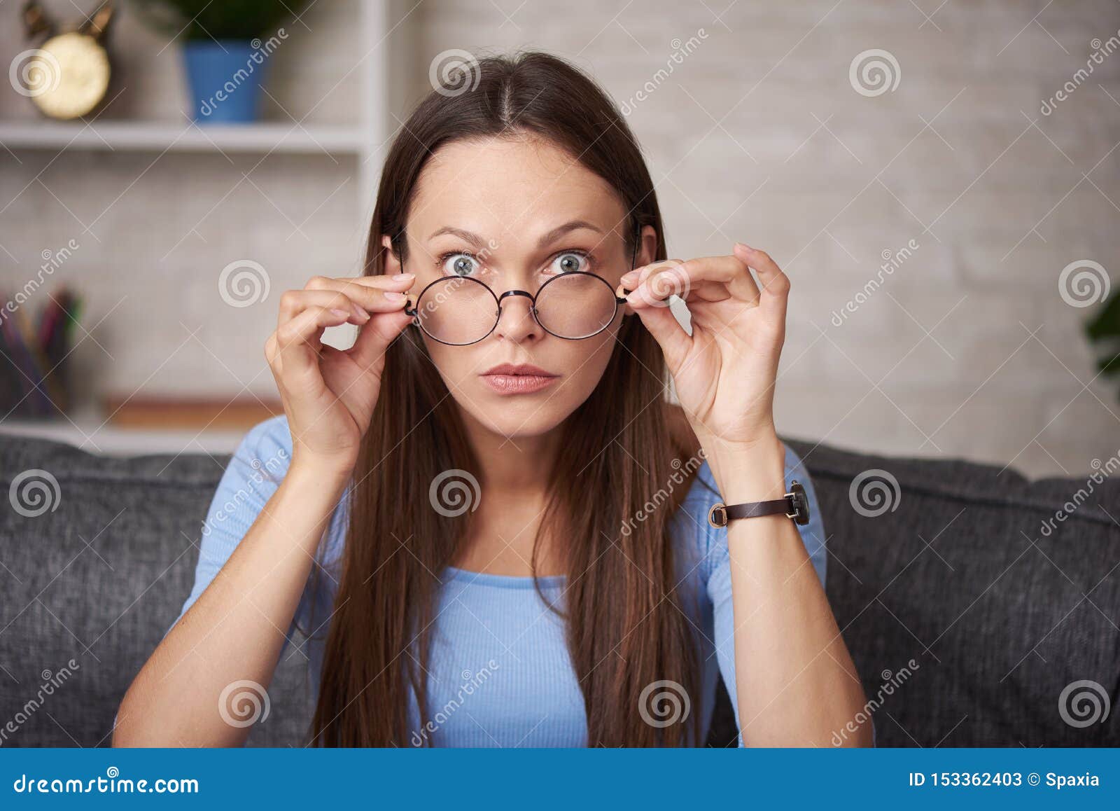 Shocked Young Woman Is Wearing Round Glasses Stock Image Image Of Beautiful Surprise 153362403