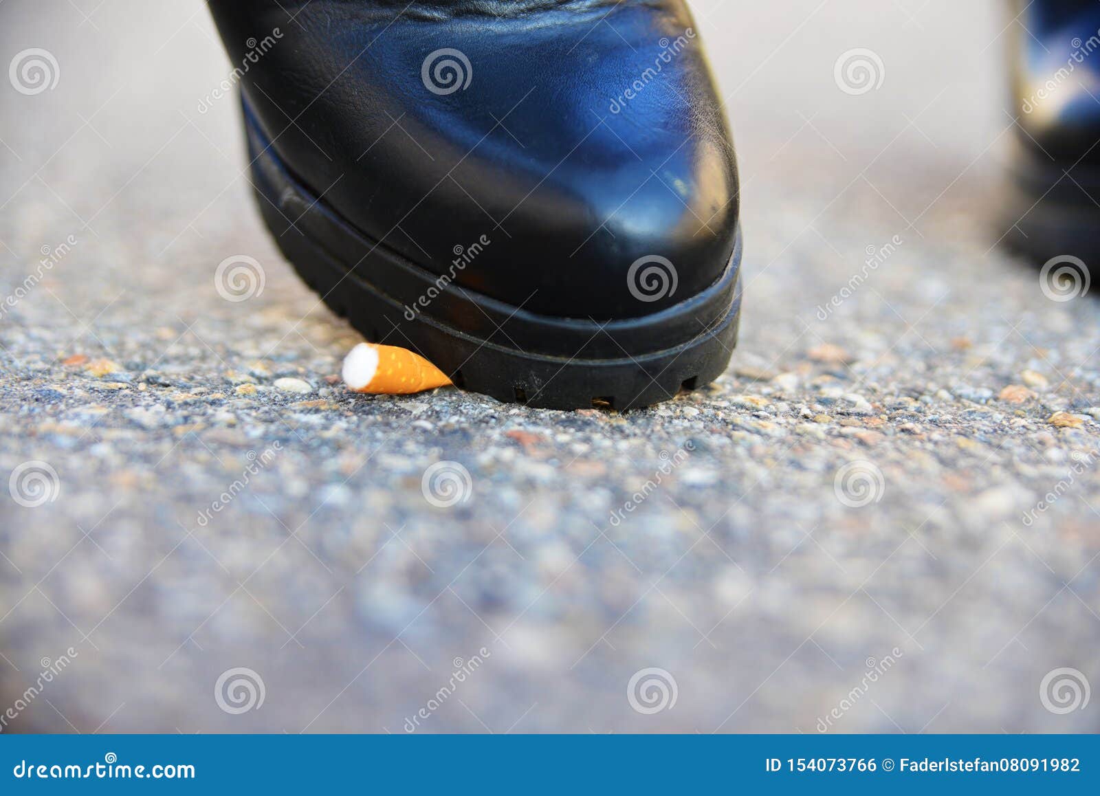 Shoe expresses a cigarette stock photo. Image of finger - 154073766