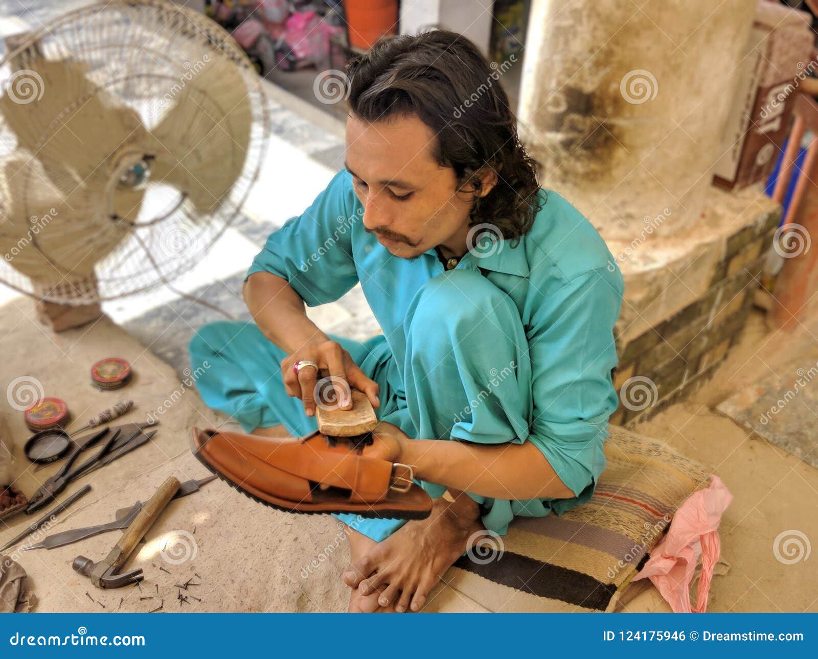 Shoe Maker from Pakistan. Poor Labour Doing Hard Work. Editorial Photo ...