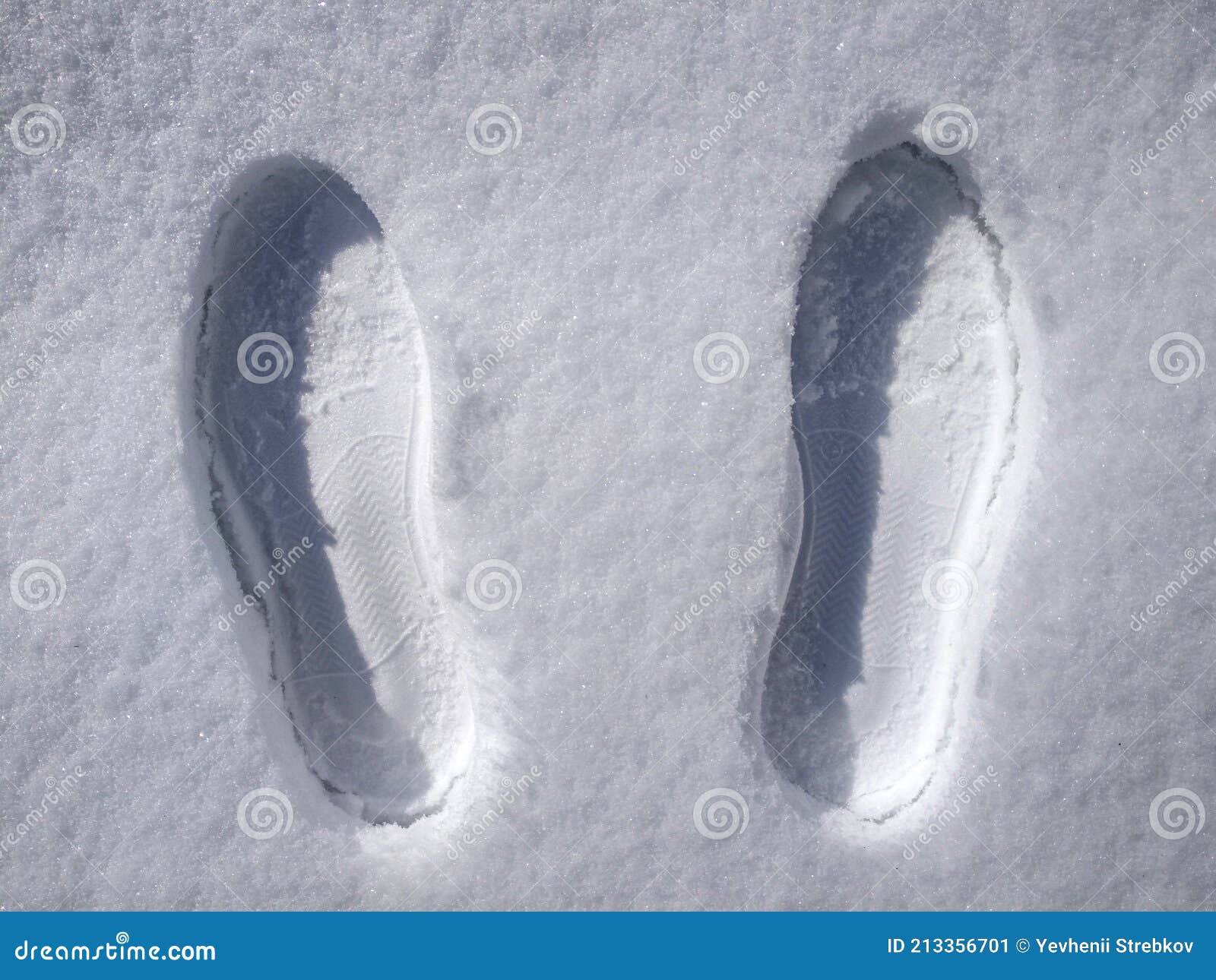 Shoe prints in the snow stock image. Image of footprints - 213356701