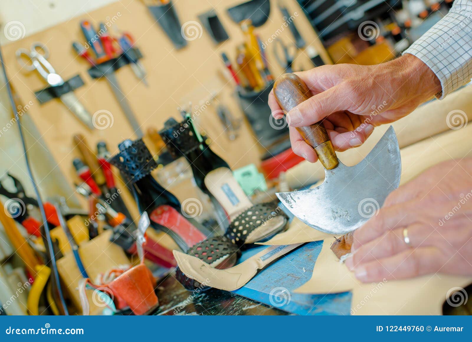 Shoe-repairer using a tool stock photo. Image of cobbler - 122449760