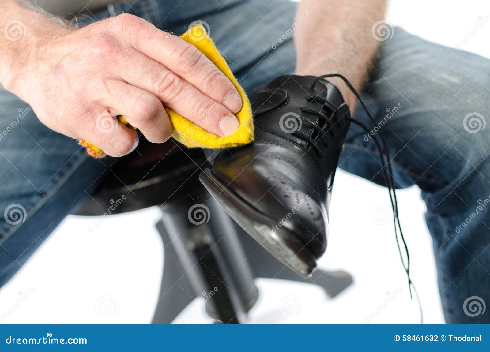 Shoe shining stock photo. Image of shoeshine, color, holding - 58461632