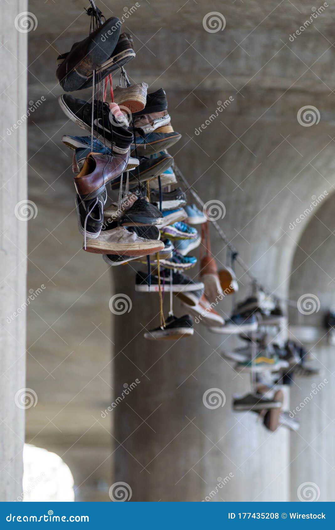 Shoe tossing stock photo. Image of dangling, hung, throw - 177435208