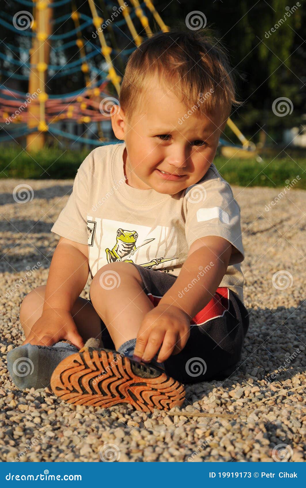 Shoeless Child Sitting on Playground Stock Image - Image of cute, metal ...