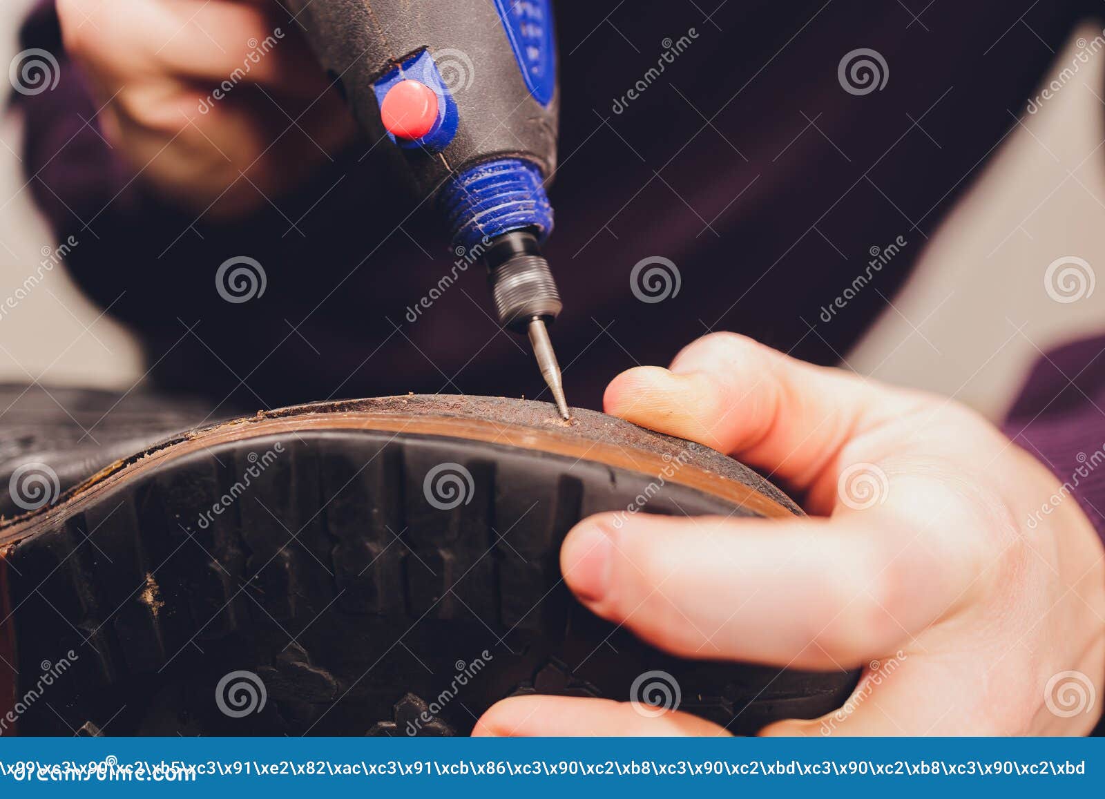 A Shoemaker Cuts the Sole of a Shoe with a Shoemaker& X27;s Automatic ...