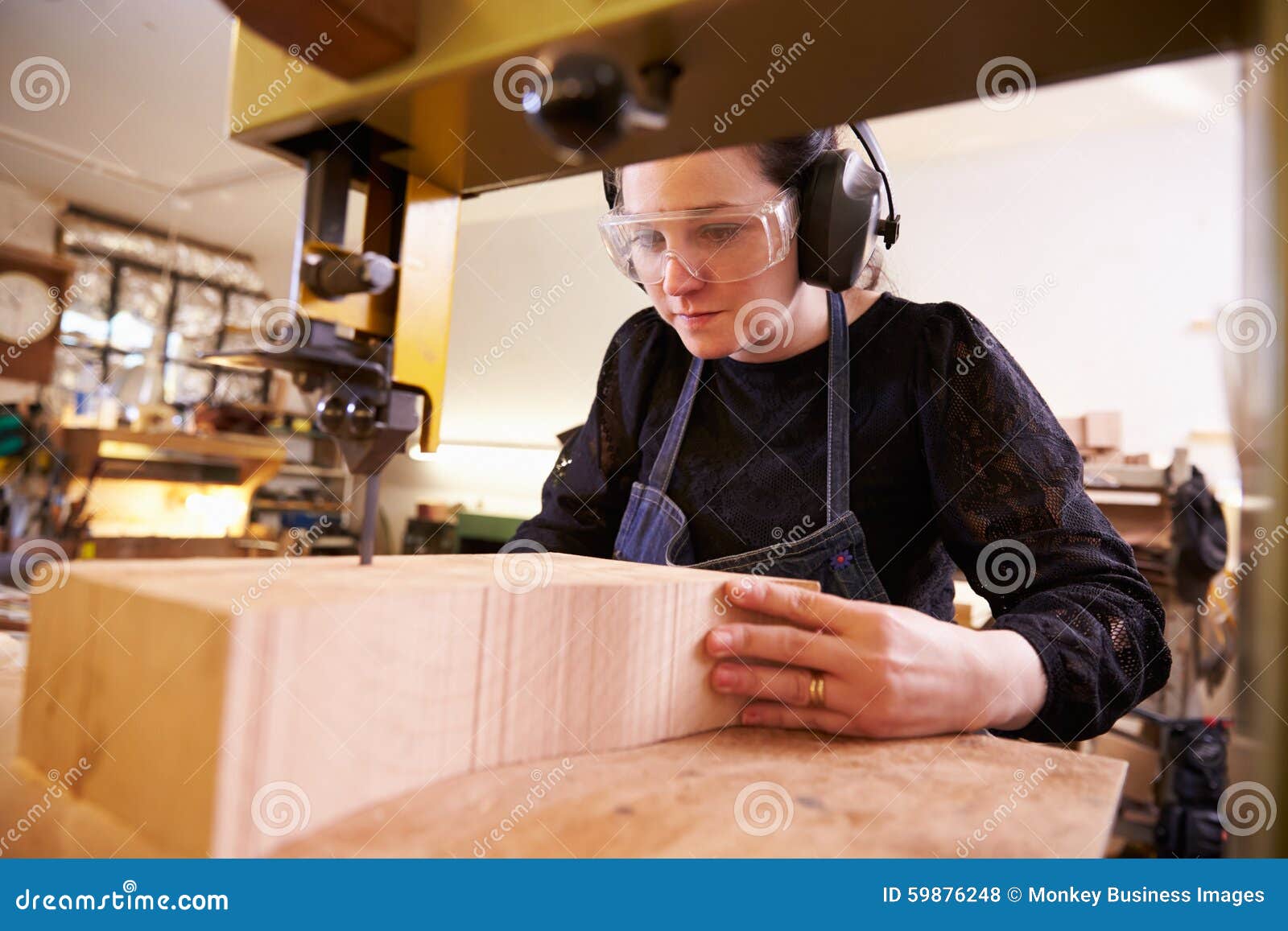 Shoemaker Cutting and Shaping Wood To Make Shoe Lasts Stock Photo ...