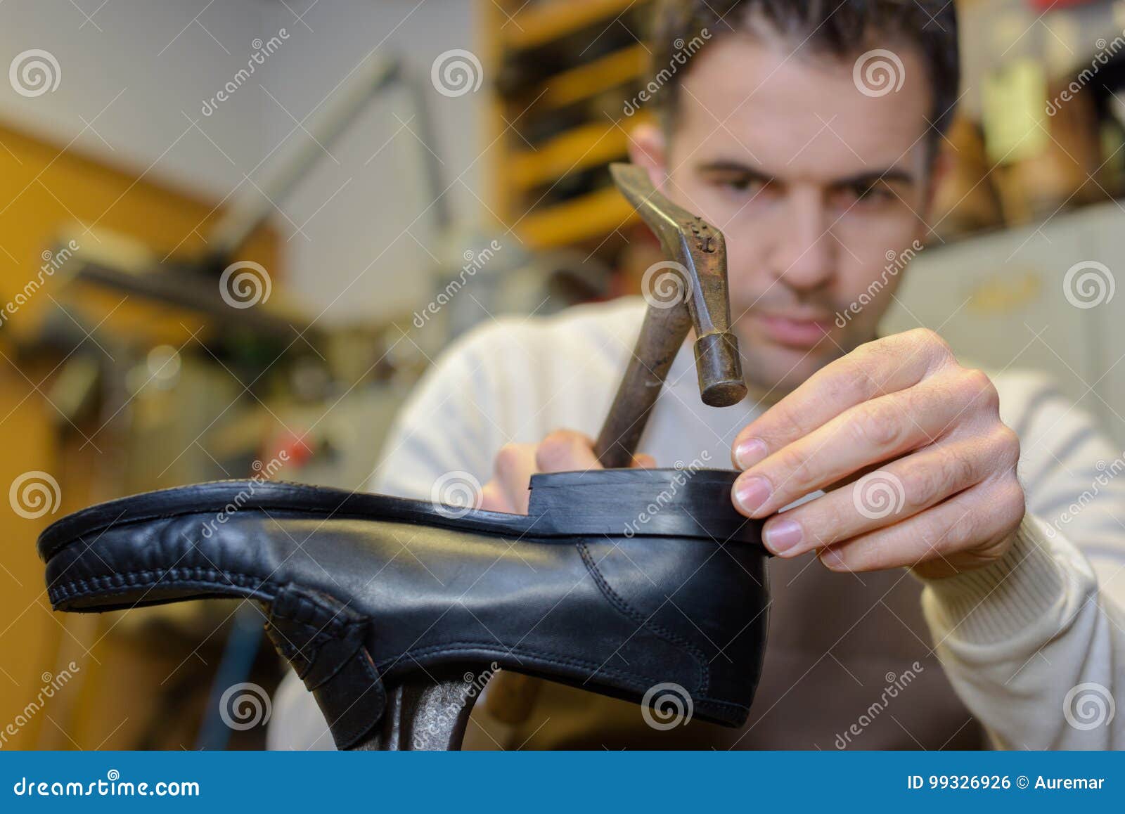 Shoemaker Hammering on Shoe in Workshop Stock Photo - Image of indoors ...