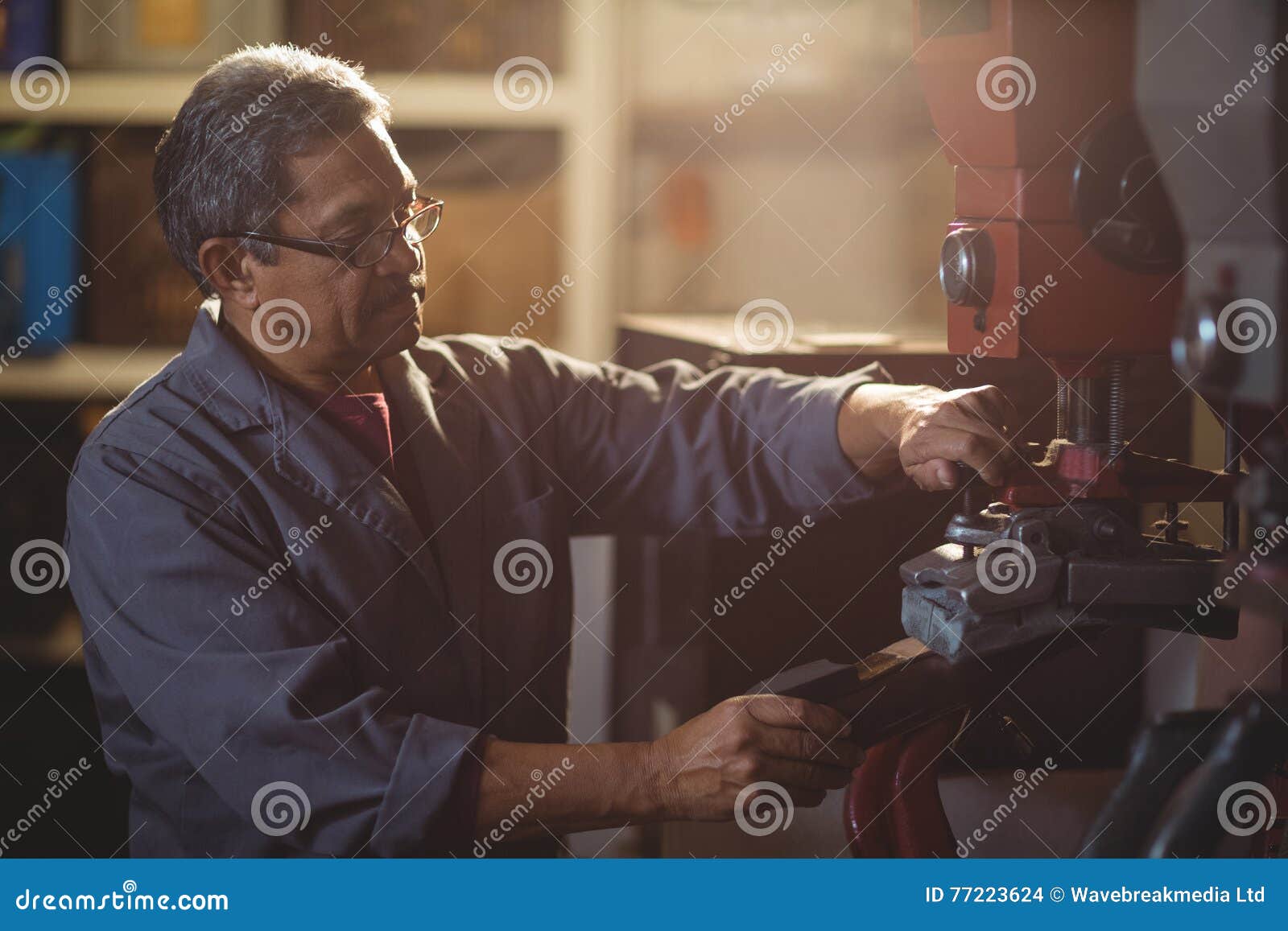 Shoemaker Making Shoe on Machine Stock Photo - Image of mixedrace ...