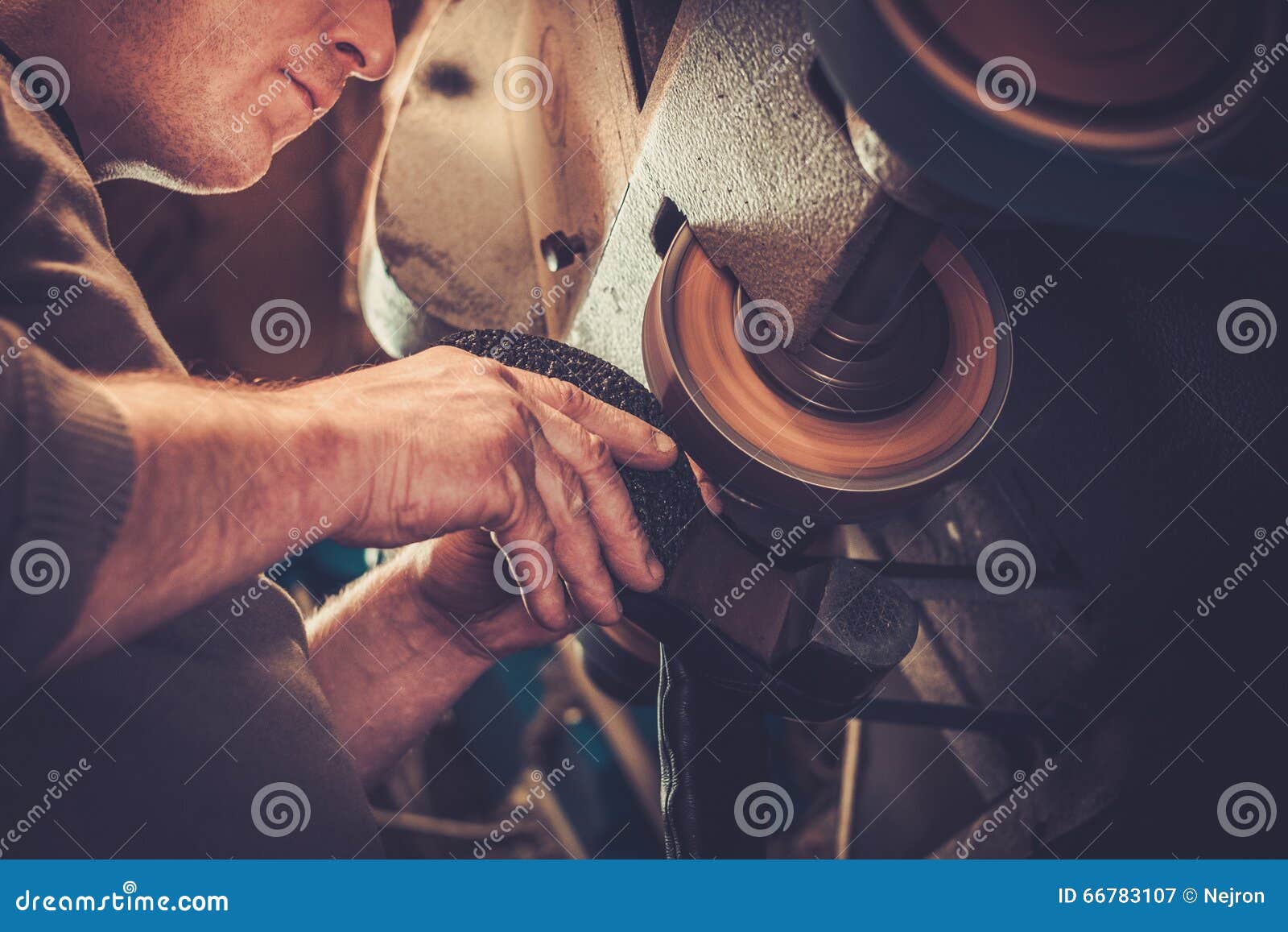 Shoemaker Performs Shoes in Studio Craft Grinder Machine. Stock Image ...