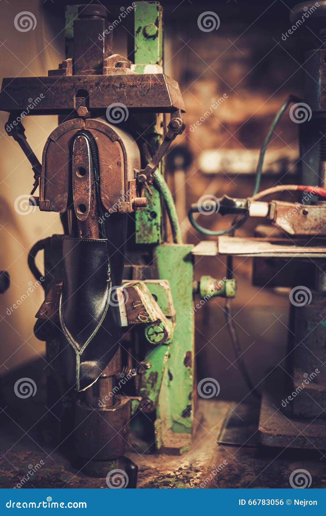 Shoemaker Performs Shoes in Studio Craft Professional Machines. Stock ...