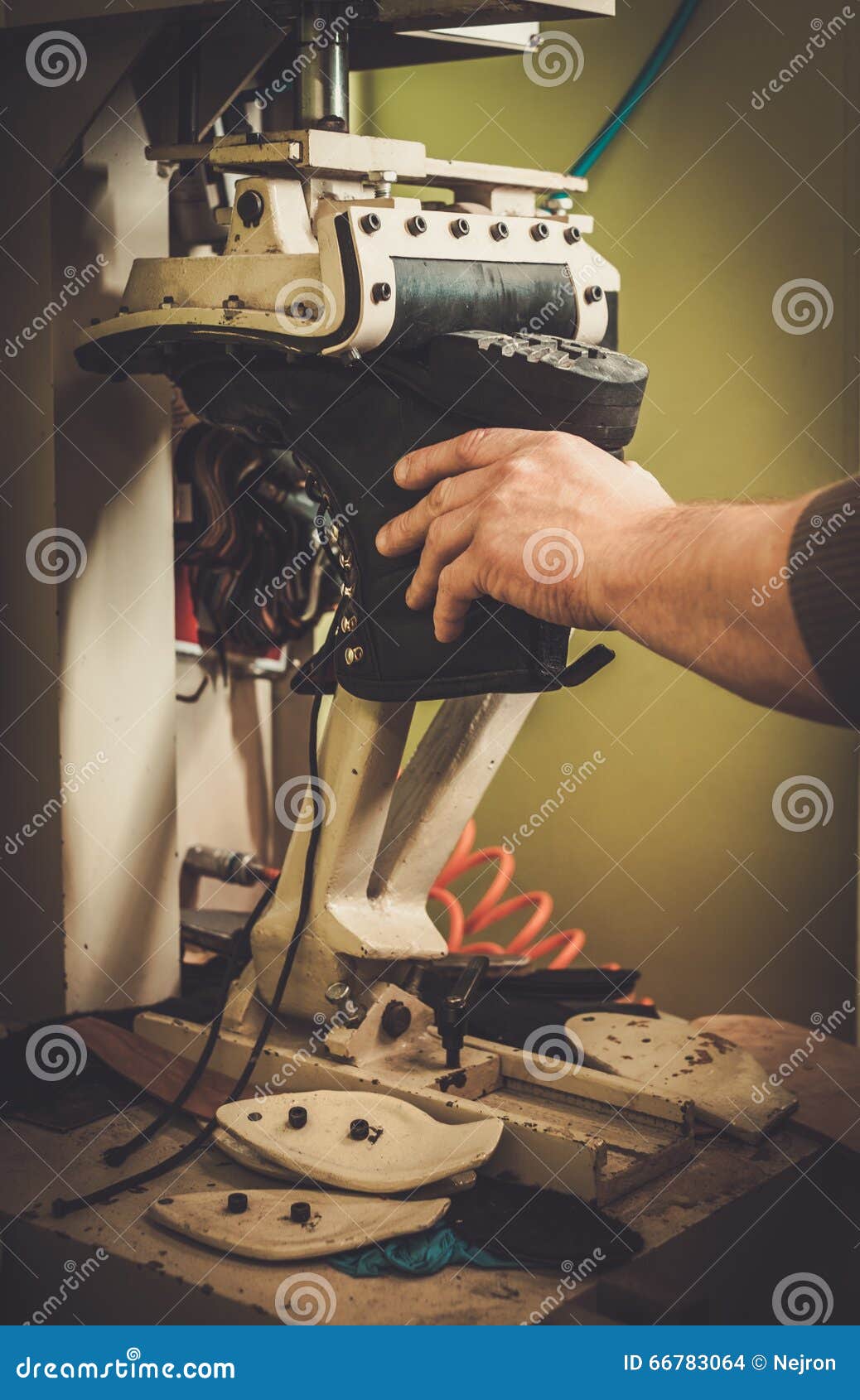 Shoemaker Performs Shoes in Studio Craft Professional Machines. Stock ...