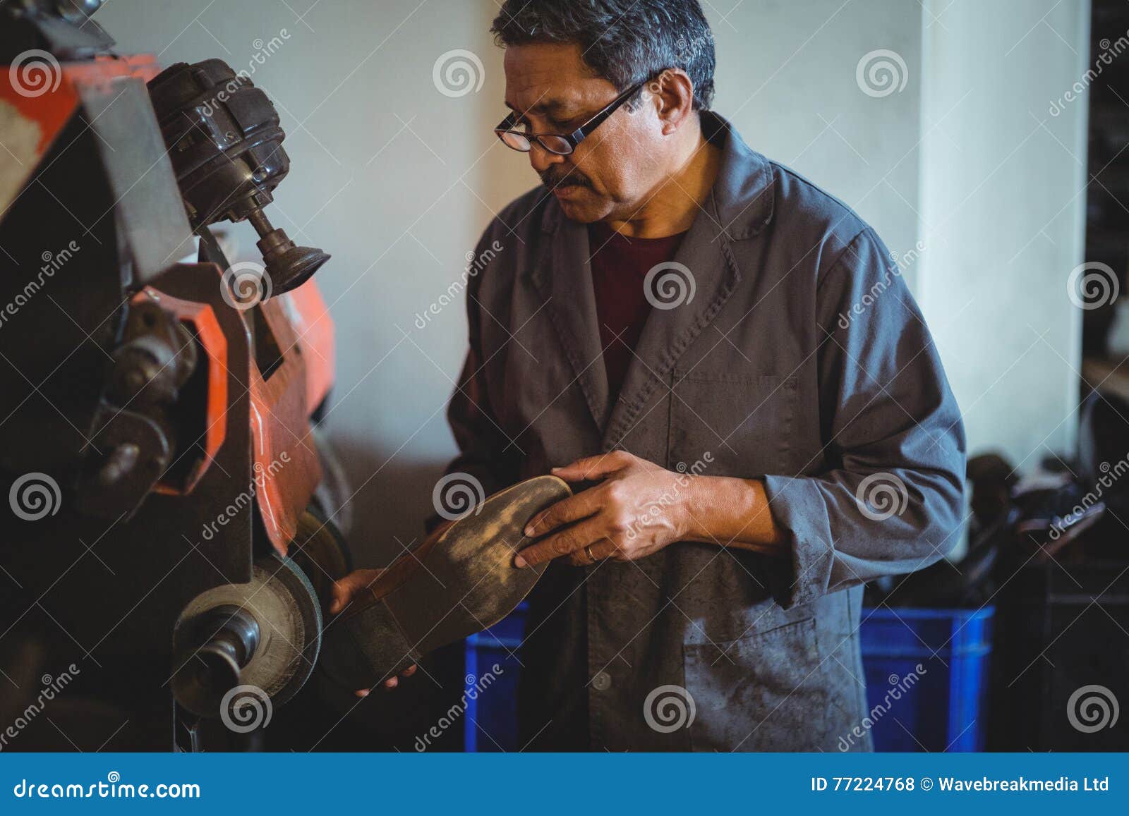 Shoemaker Polishing a Shoe with Machine Stock Photo - Image of manual ...