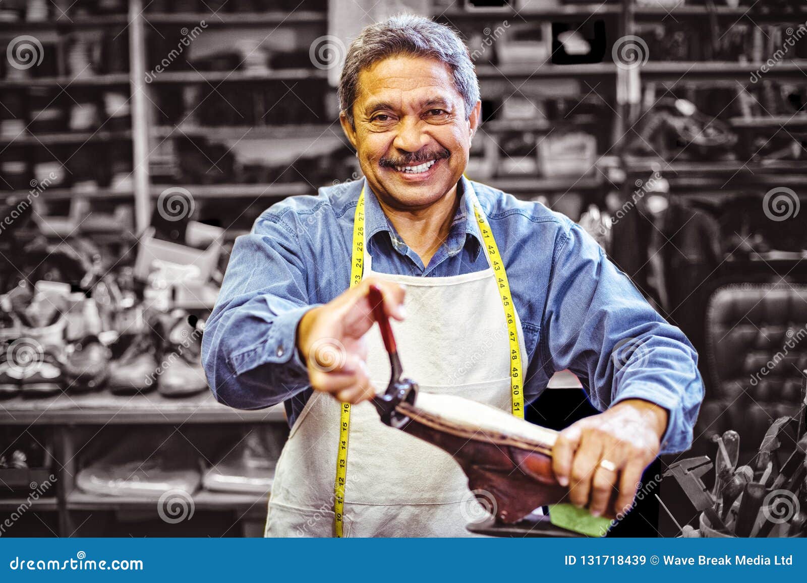 Shoemaker repairing a shoe stock image. Image of shoemaker - 131718439