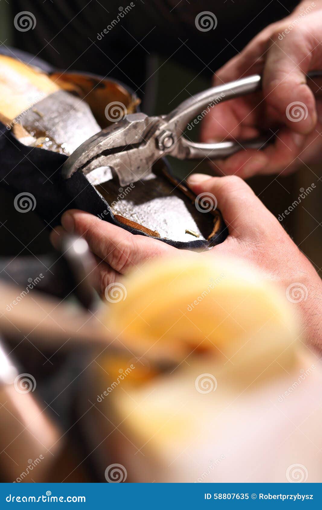 Shoemaker repairs shoes stock image. Image of loafers - 58807635