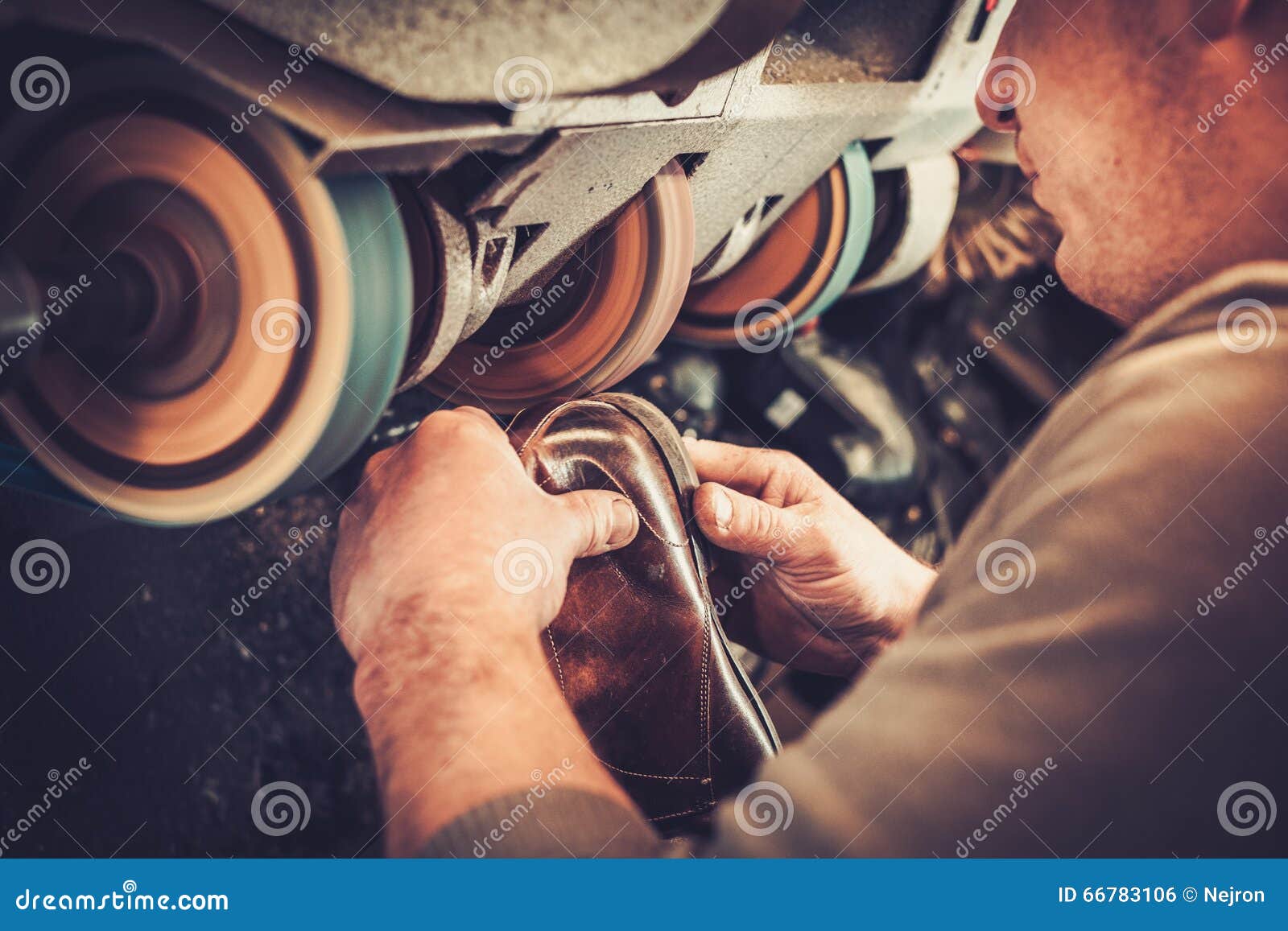 Shoemaker Repairs Shoes in Studio Craft Grinder Machine. Stock Photo ...
