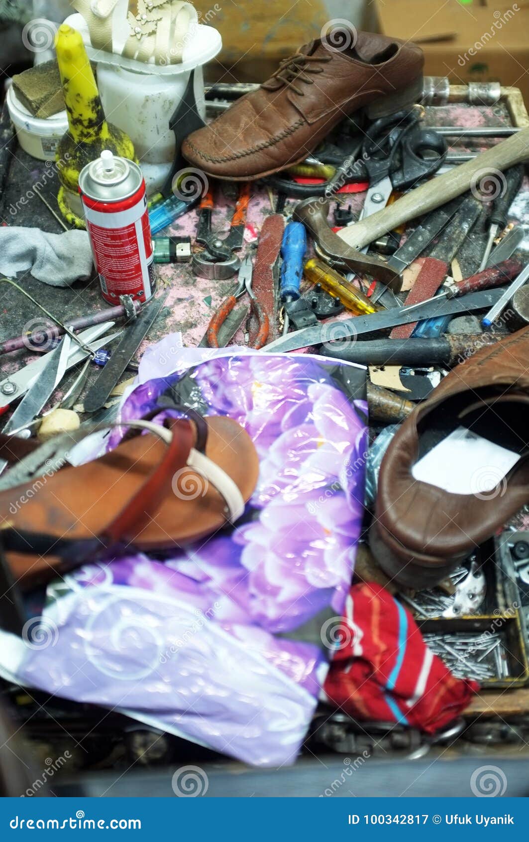 Shoemaker`s messy tools stock image. Image of spray - 100342817