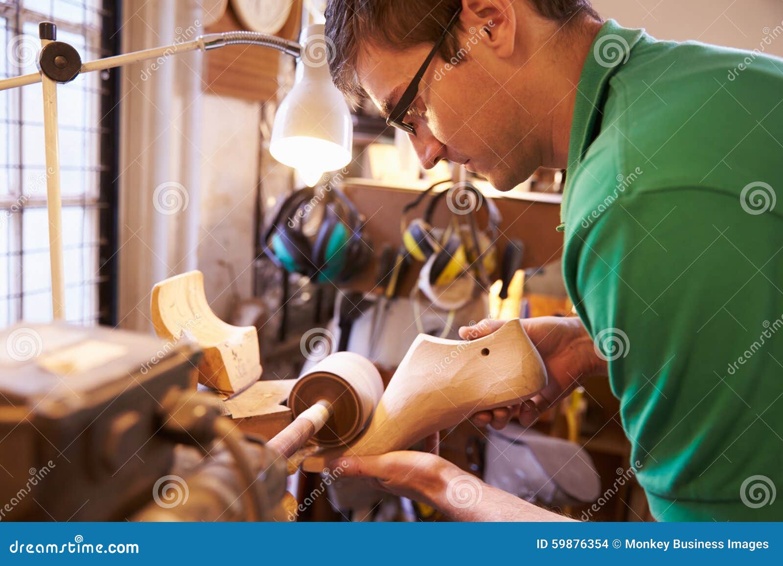 Shoemaker Sanding Shoe Lasts in a Workshop Stock Photo - Image of ...