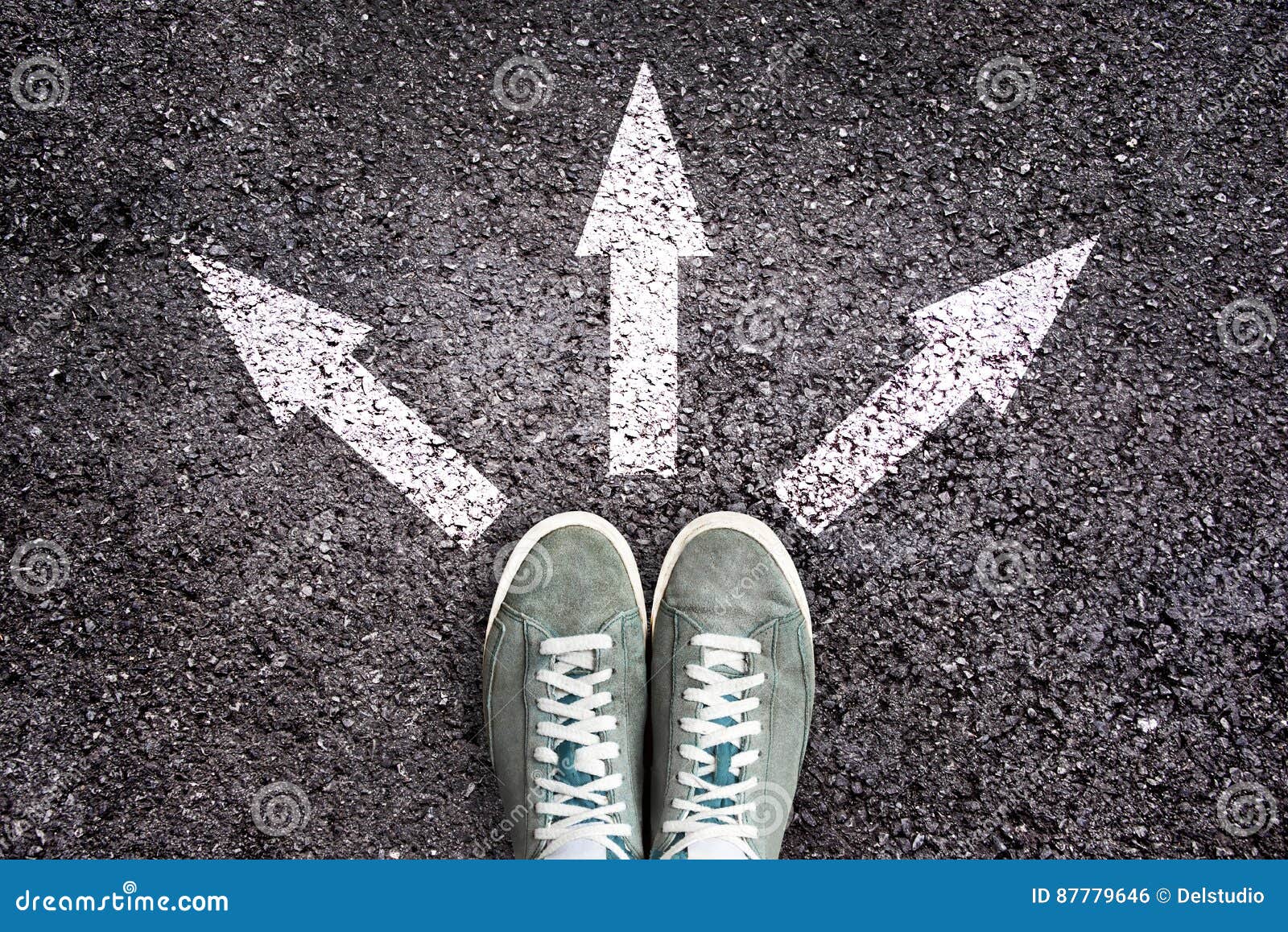 Shoes and Arrows Pointing in Different Directions on Floor Stock Photo ...