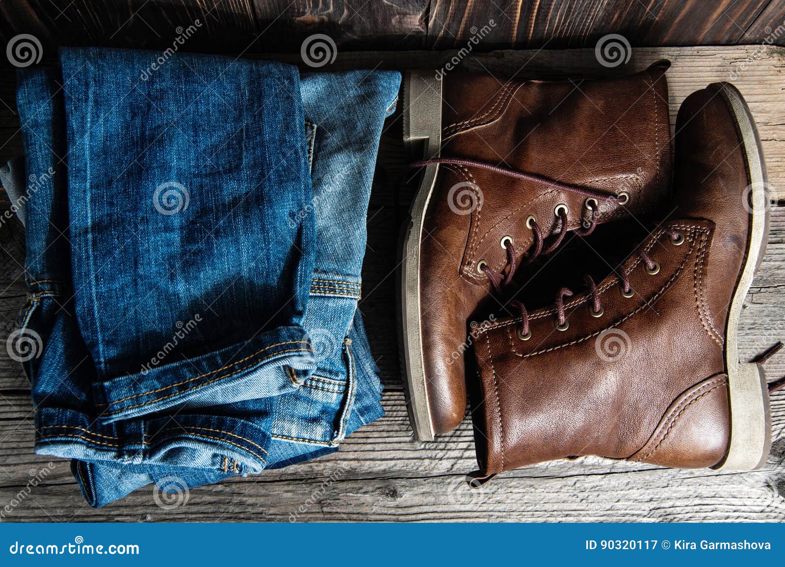 Shoes and stack of jeans stock image. Image of jeans - 90320117