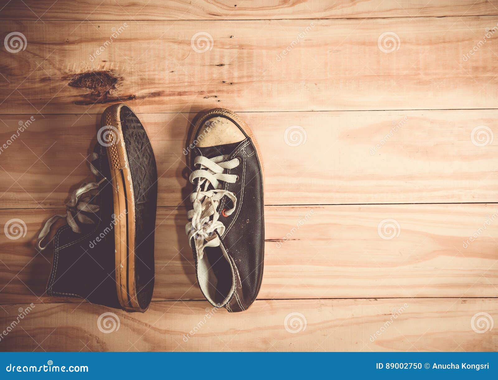 Shoes on wood background. stock photo. Image of repair - 89002750