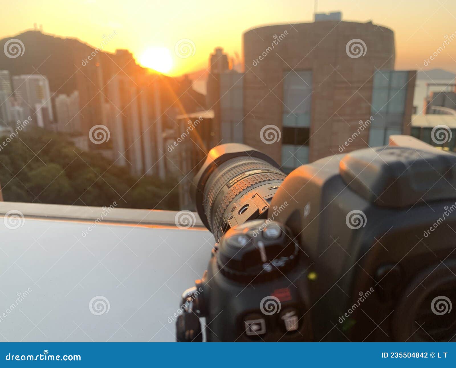 Shoot the Sun at Sunset on the Roof Stock Photo - Image of view ...