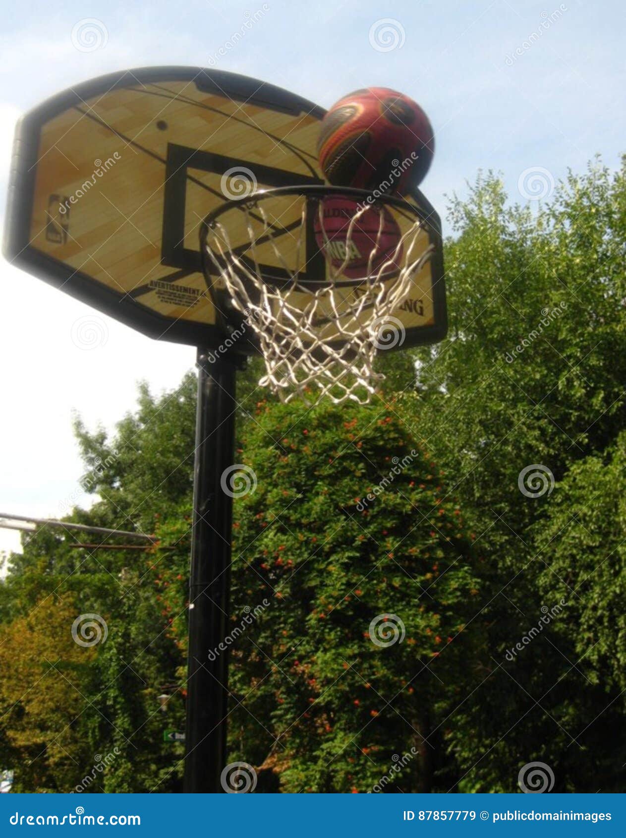 Shooting-the-basketball-at-the-hoop Picture. Image: 87857779
