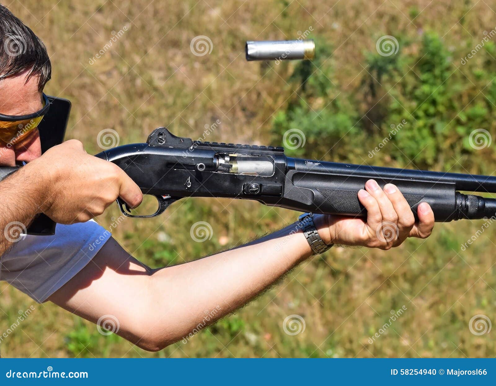 Shooting with a gun stock photo. Image of outdoors, ammunition - 58254940