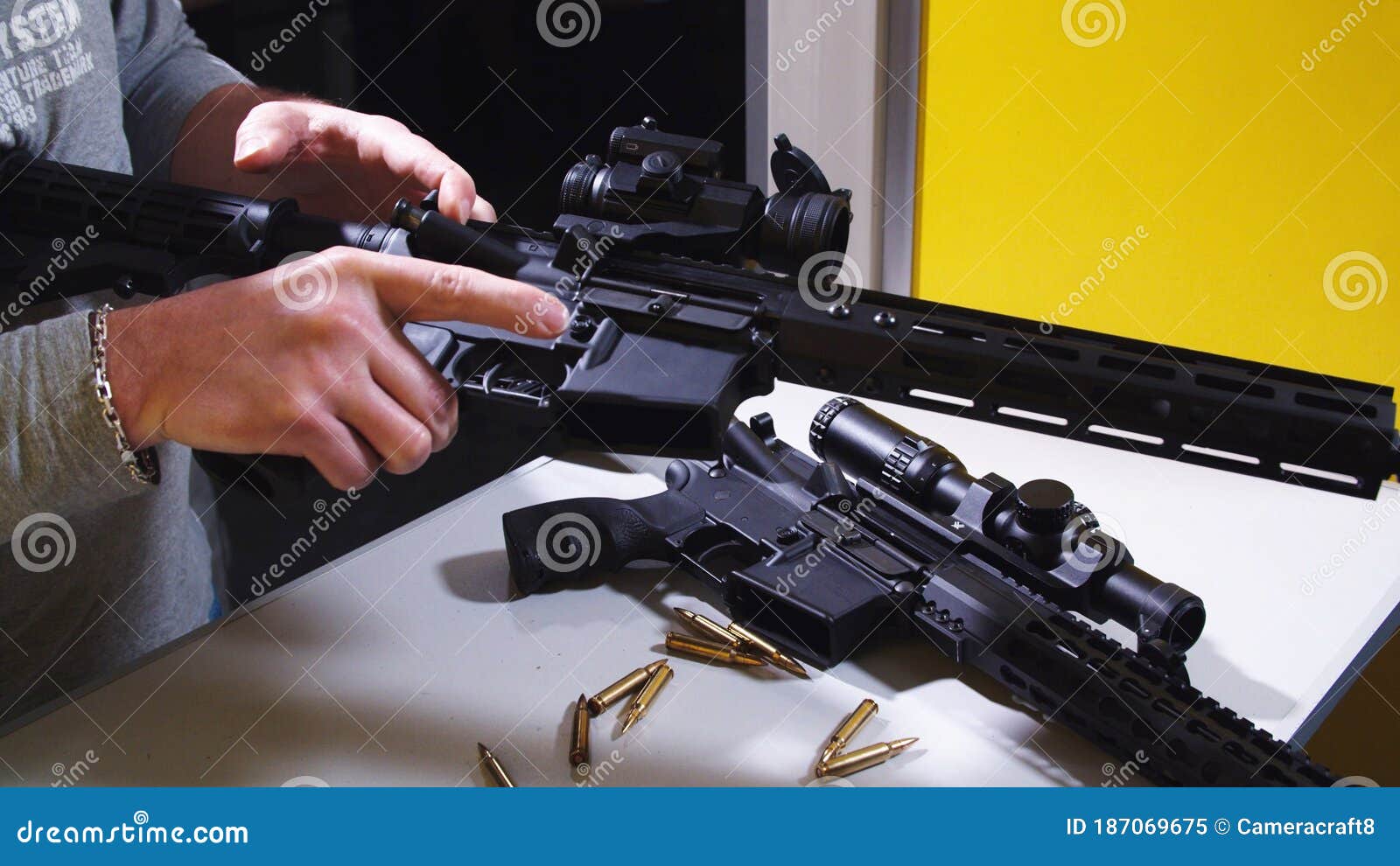 Shooting Instructor Loading an Assault Rifle at a Shooting Range. Stock ...