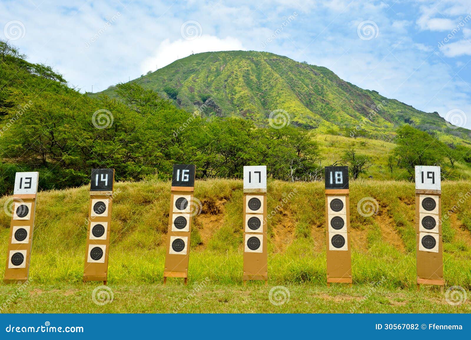 Shooting Range Targets in Line Under a Mountain Stock Photo - Image of ...