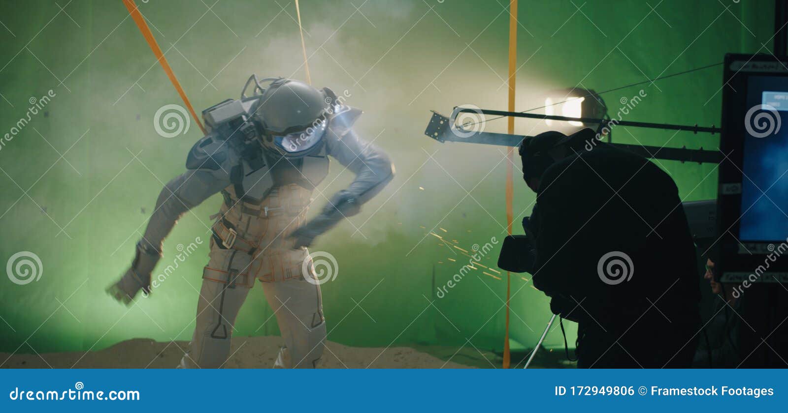 Shooting a Scene with an Astronaut Struggling Against the Wind Stock ...