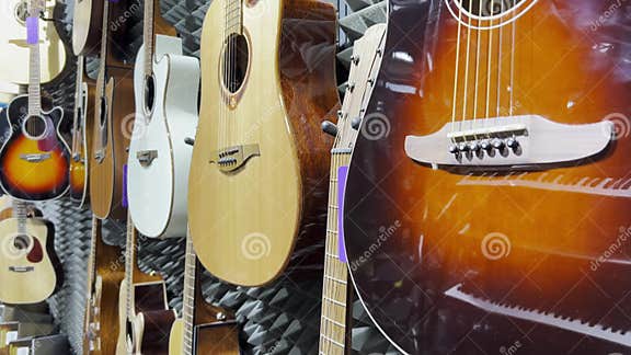 Shop with Acoustic Guitars. Different Types of Guitars Stock Image ...