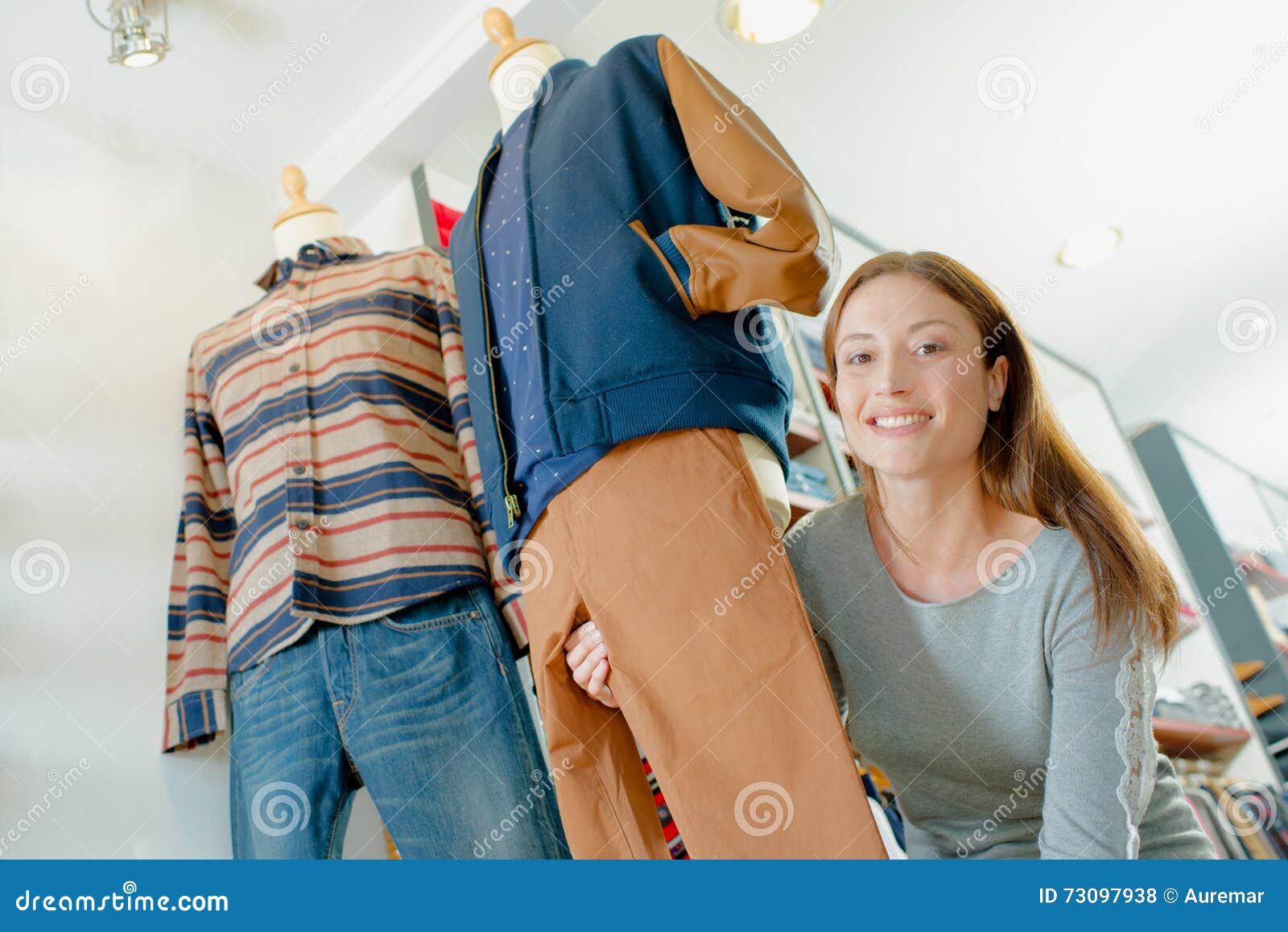 Shop Assistant Dressing Dummy Stock Photo - Image of clothes, radiant ...