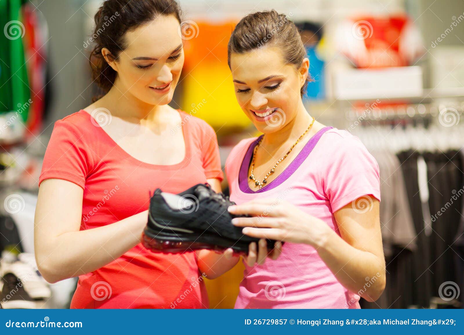 Shop Assistant Helping Customer Stock Image - Image of looking, buying ...