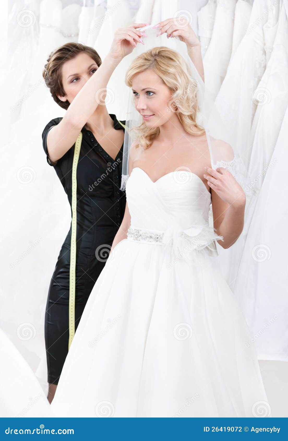 Shop Assistant Helps To Fix the Wedding Veil Stock Photo - Image of ...