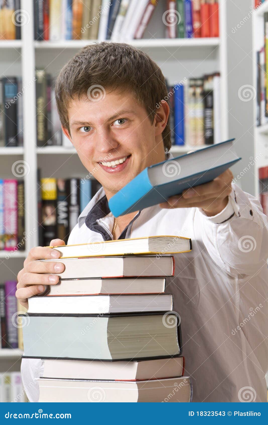 Shop assistant offer book stock image. Image of stack - 18323543