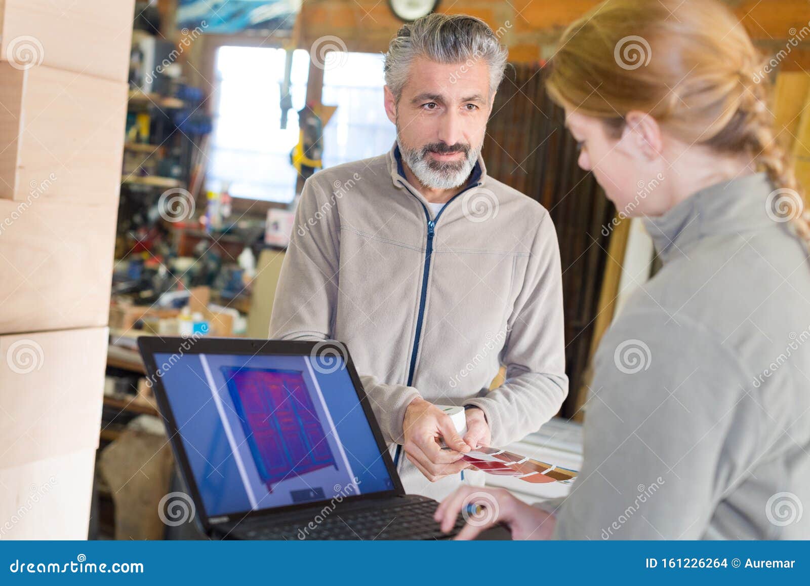 Shop Assistant Researching Customers Paint References on Computer Stock ...