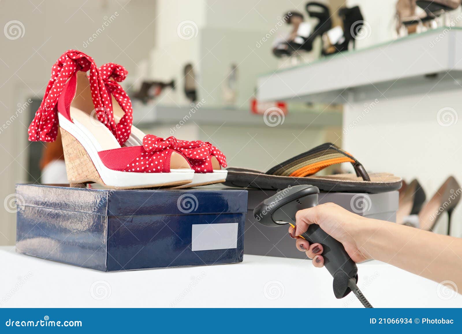 Shop Assistant Scanning Code on Shoe Box Stock Photo - Image of ...