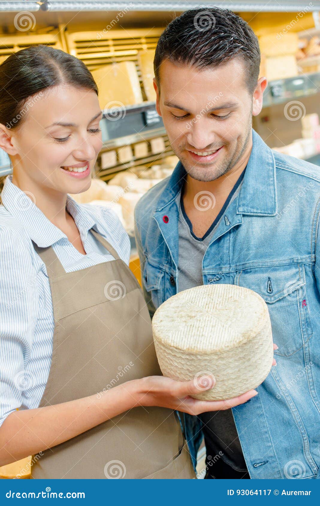 Shop Assistant Showing Customer Whole Cheese Stock Image - Image of ...