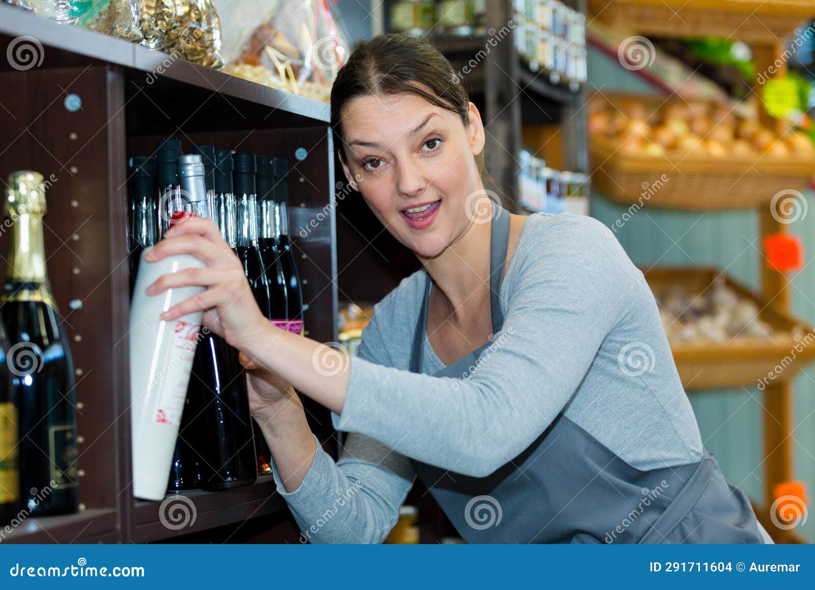 Shop Assistant Stacking Bottles Wine on Shelf Stock Photo - Image of ...