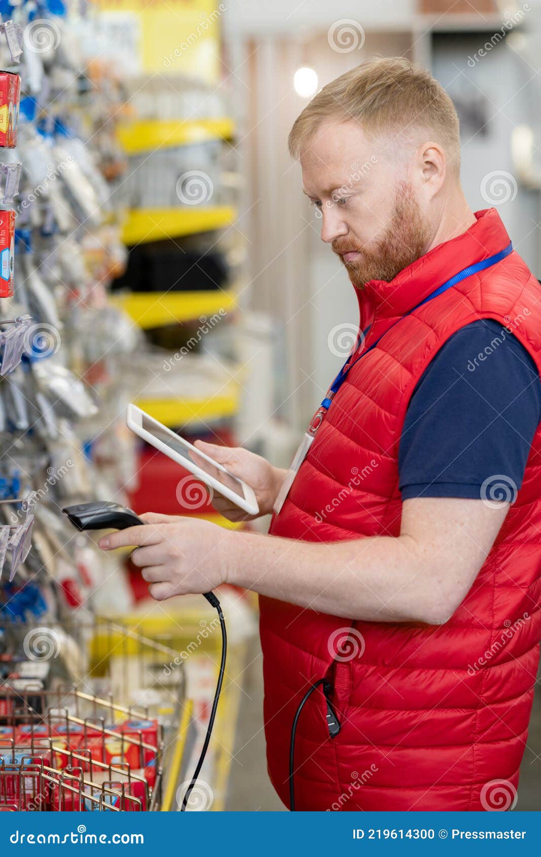 Shop Assistant with Tablet Using Scanner Stock Photo - Image of ...